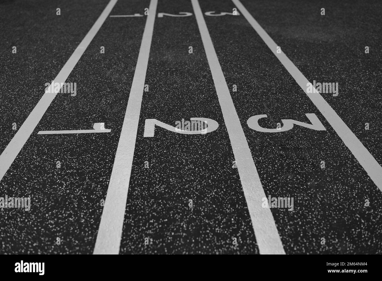 Running track numbers Black and White Stock Photos & Images - Alamy