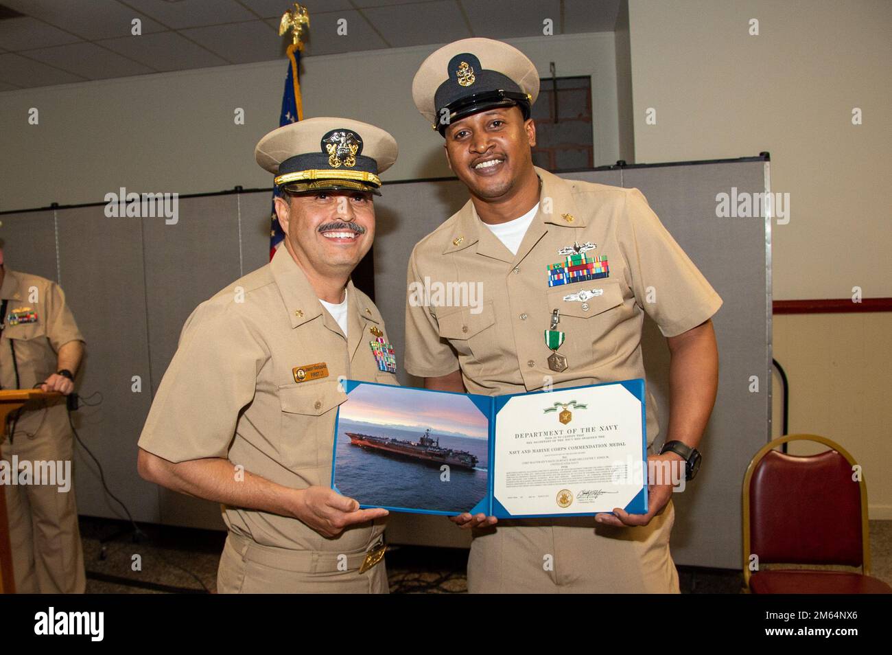 U.S. Navy Lt. Cmdr. Jason Gonzales, left, from Herford, Texas, the ...