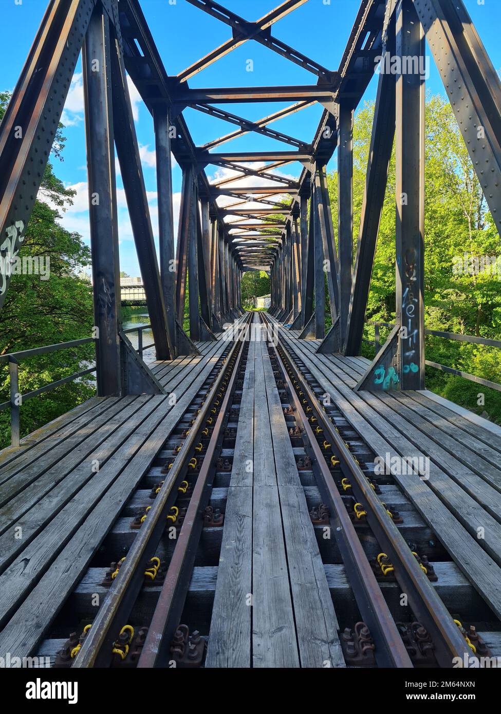 A train railway on the steel bridge Stock Photo - Alamy