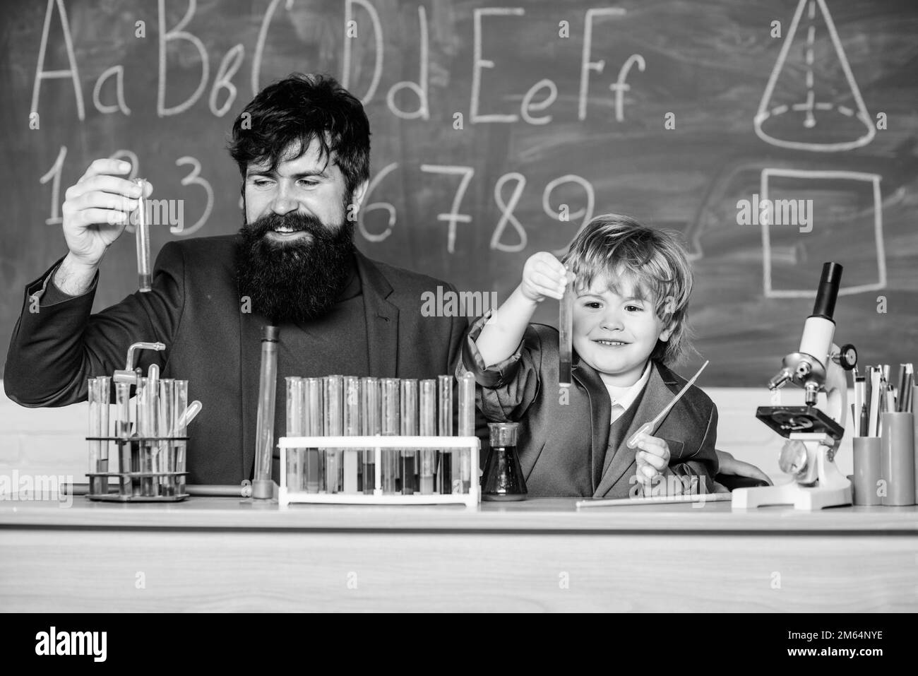 laboratory research and development. Back to school. teacher man with ...