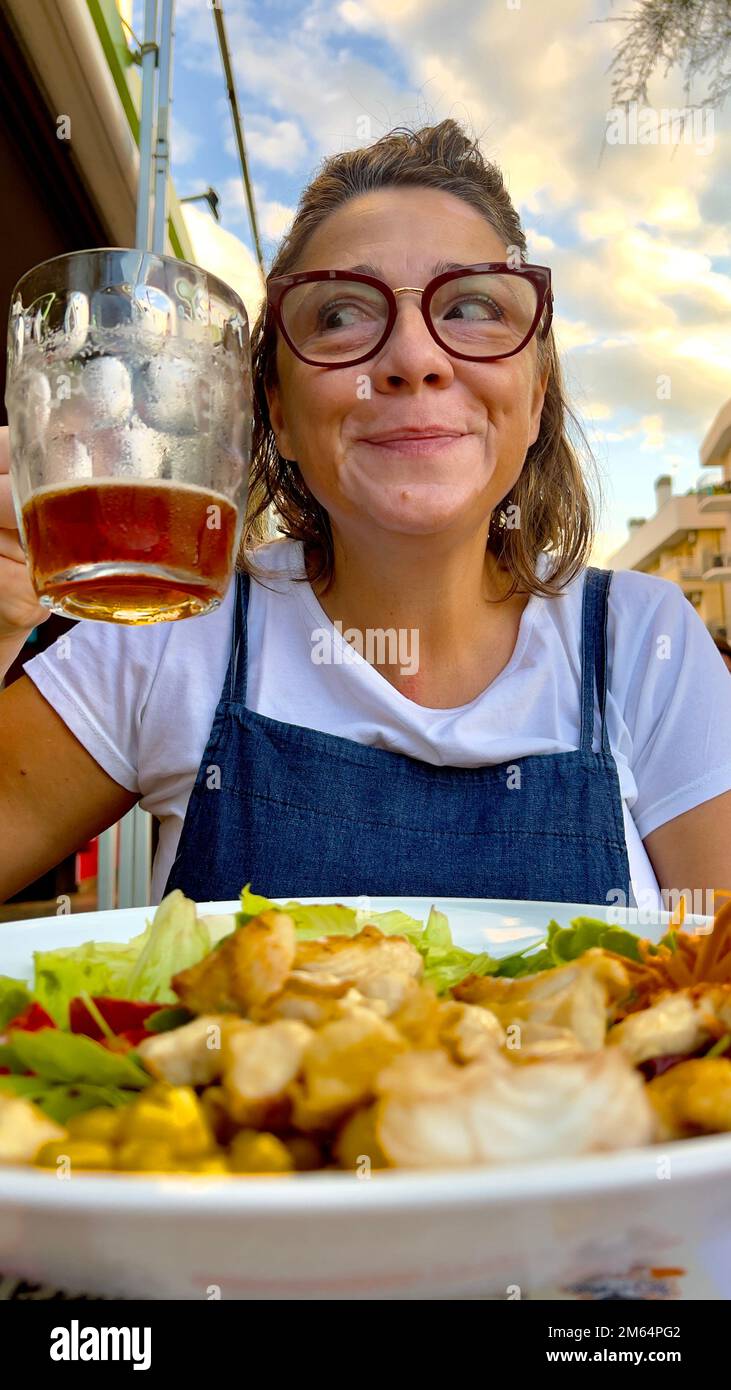 young woman drinking beer Stock Photo - Alamy