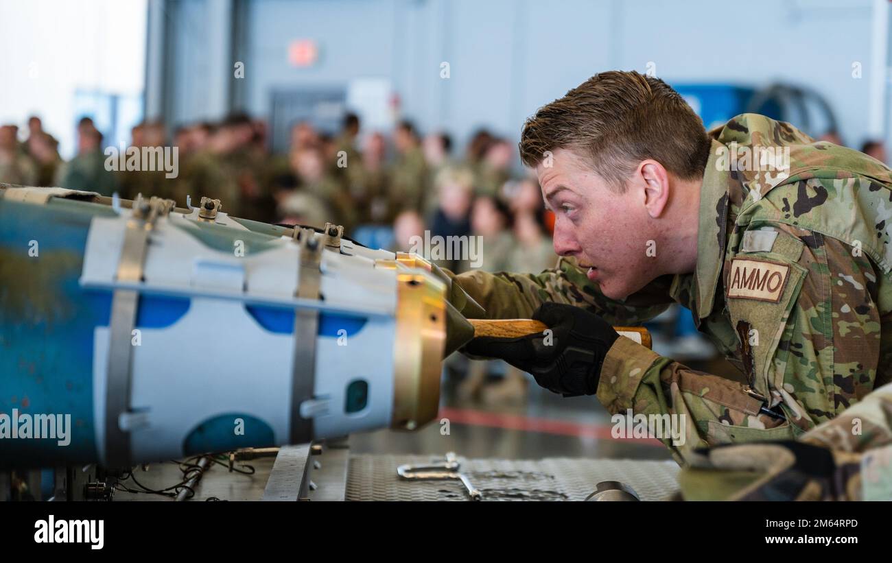 Senior Airman Daniel Foster, 2nd Munitions Squadron stockpile management crew member, assembles ...