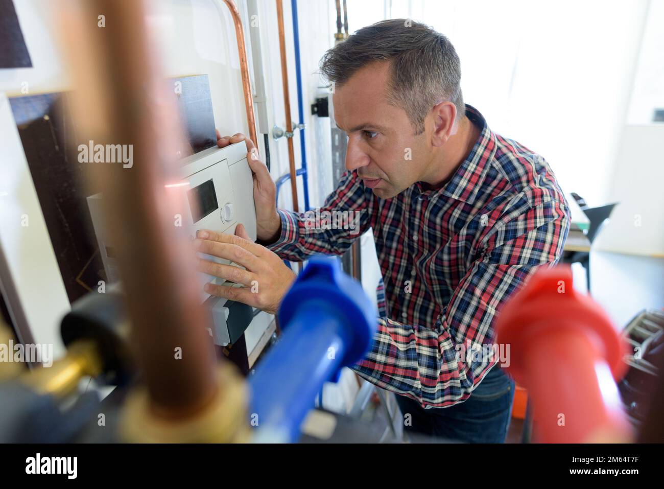 factory engineer configures a complex production plant Stock Photo - Alamy
