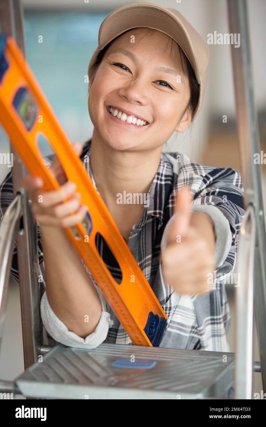 Happy female builder showing hi-res stock photography and images - Alamy