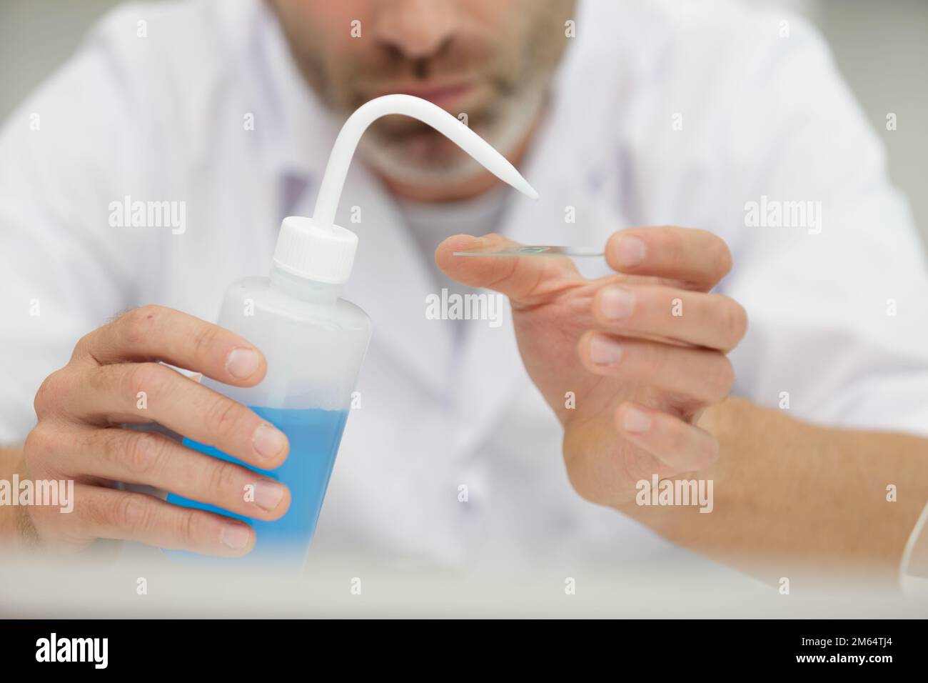 man and a successful experiment Stock Photo - Alamy