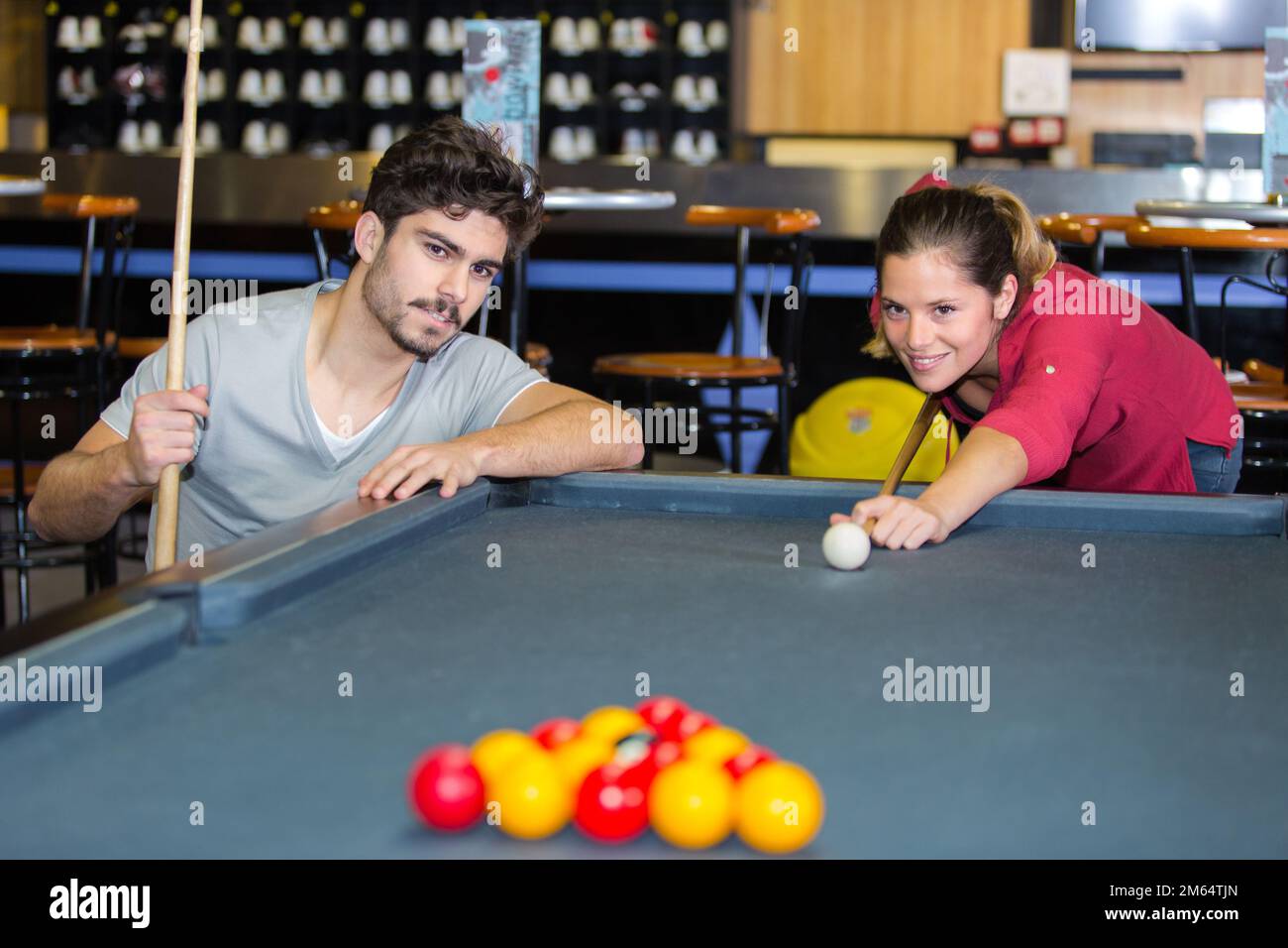 couple playing billiards and bonding Stock Photo - Alamy