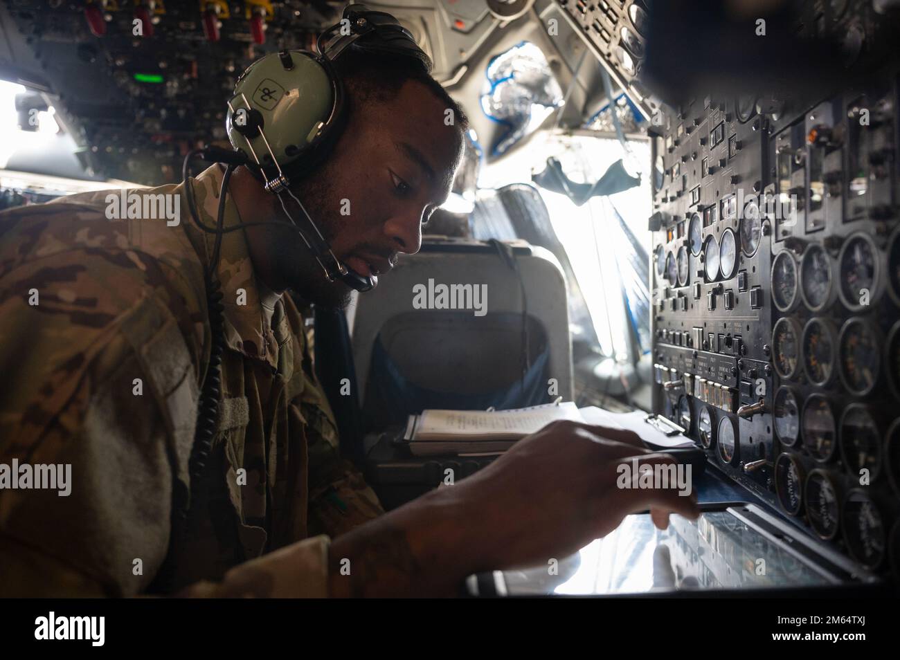 A U.S. Air Force flight engineer assigned to the 968th Expeditionary ...