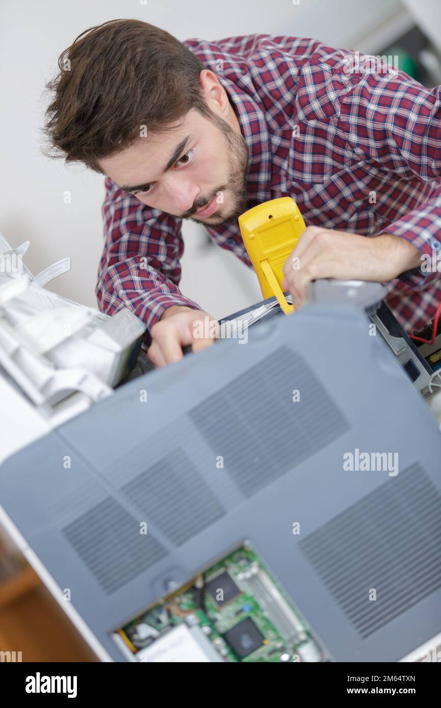 Digital multimeter technician using hi-res stock photography and images ...