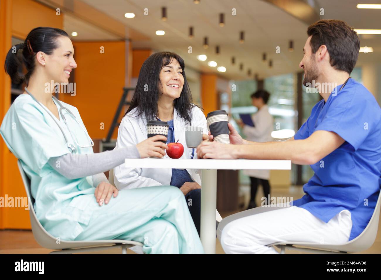 group of doctors in the cafeteria or canteen Stock Photo - Alamy