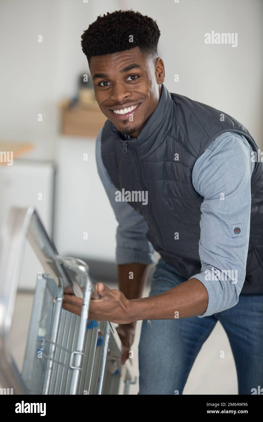 Man ladder kitchen hi-res stock photography and images - Alamy