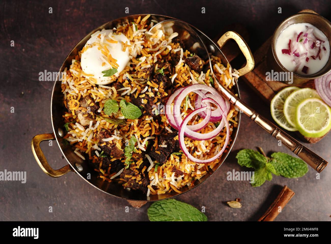 Homemade Goat Fry biryani | Mutton dum biryani served with yogurt raita ...