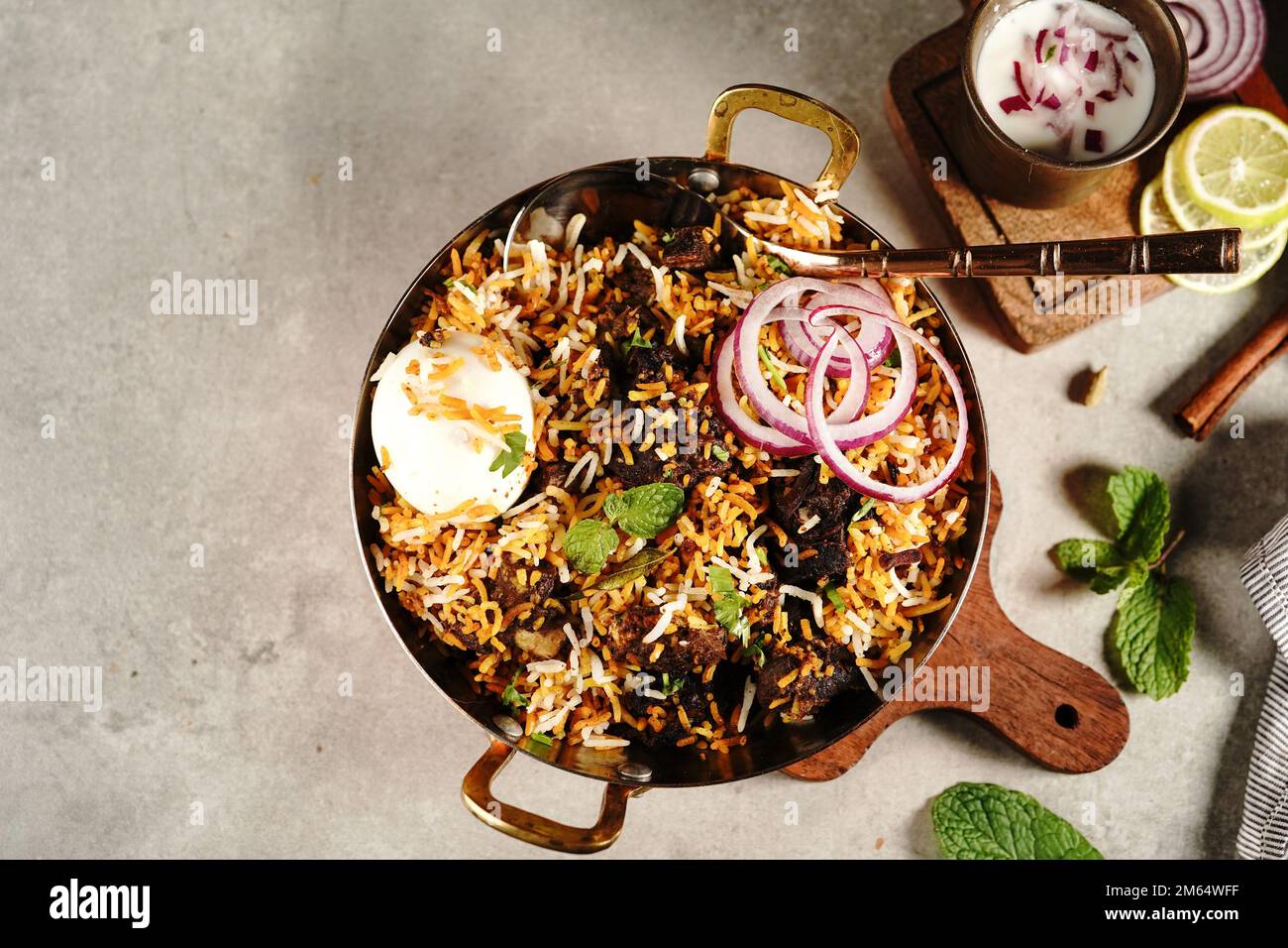 Homemade Goat Fry biryani | Mutton dum biryani served with yogurt raita ...