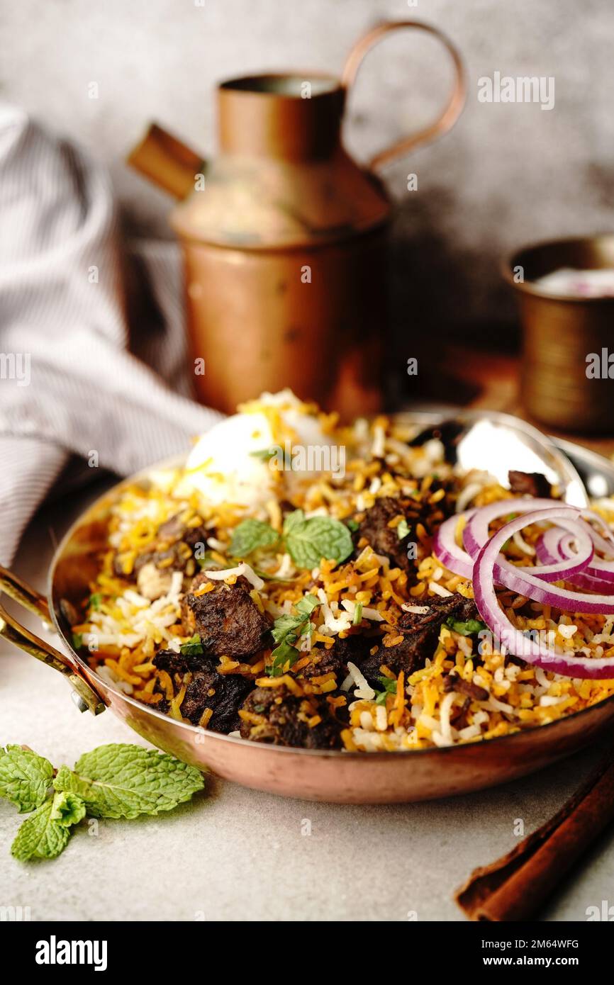 Homemade Goat Fry biryani | Mutton dum biryani served with yogurt raita ...