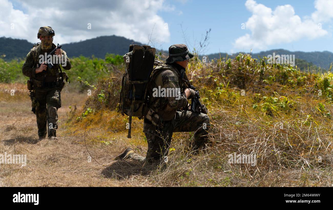 A U.S. Navy SEAL with Naval Special Operations Group and an Australian ...