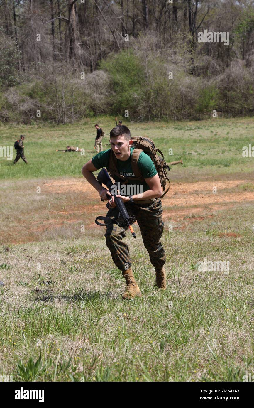 A U.S. Marine Corps officer candidate, Robert Thorington, runs during a ...
