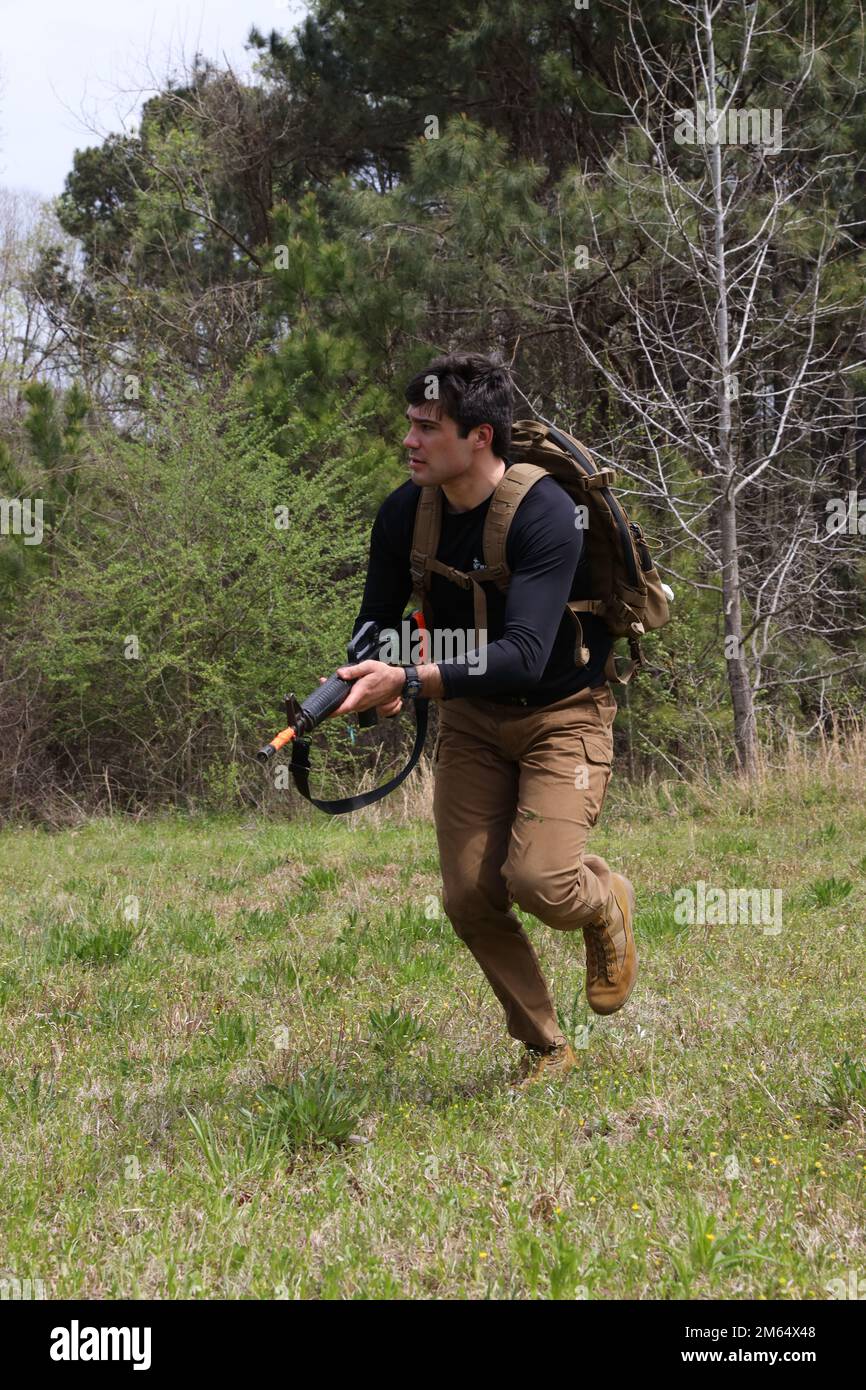 A U.S. Marine Corps officer candidate, James Mozingo, runs during a ...