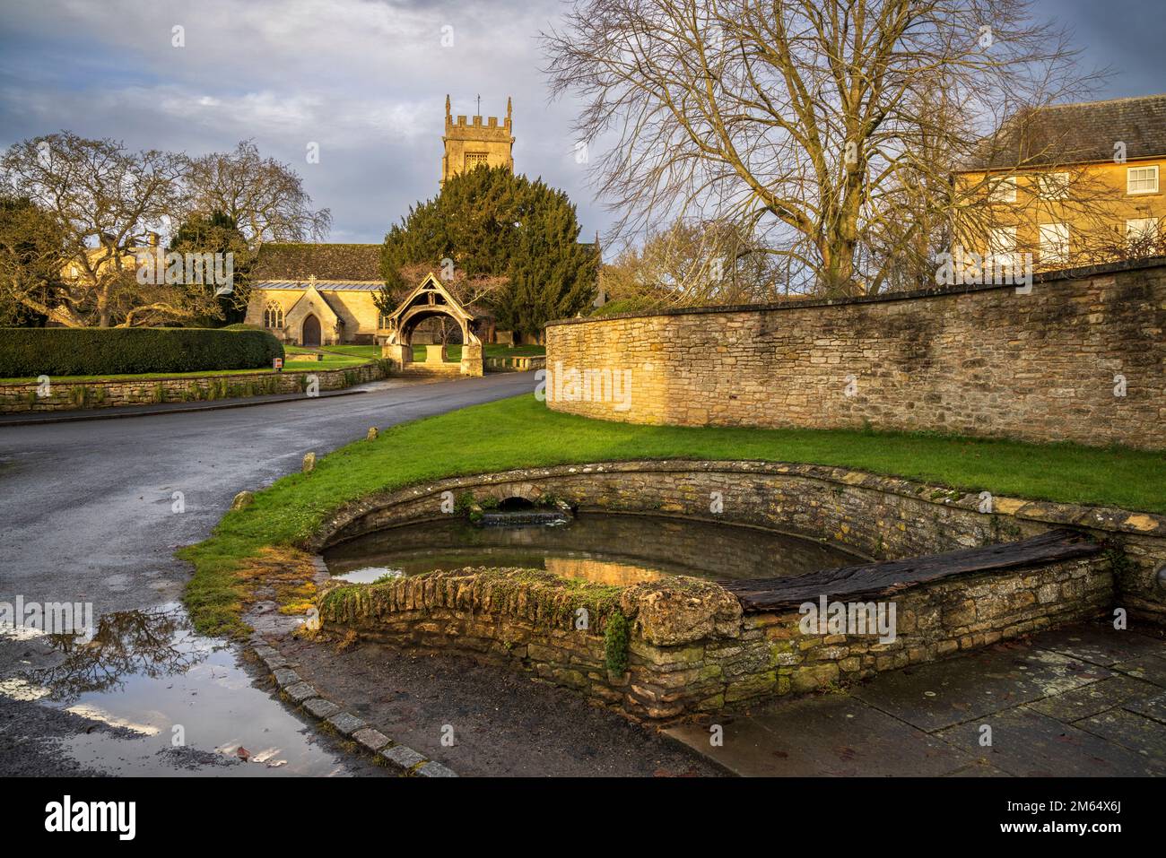 The Cotswold village of Overbury in the late afternoon winter sun ...