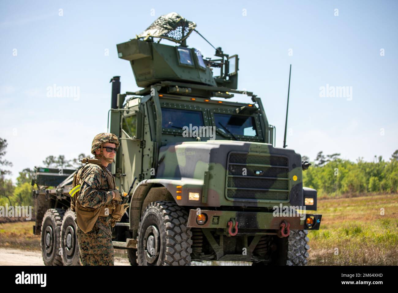 U.S. Marine Corps Staff Sgt. Adam W. Hess, range safety officer with ...