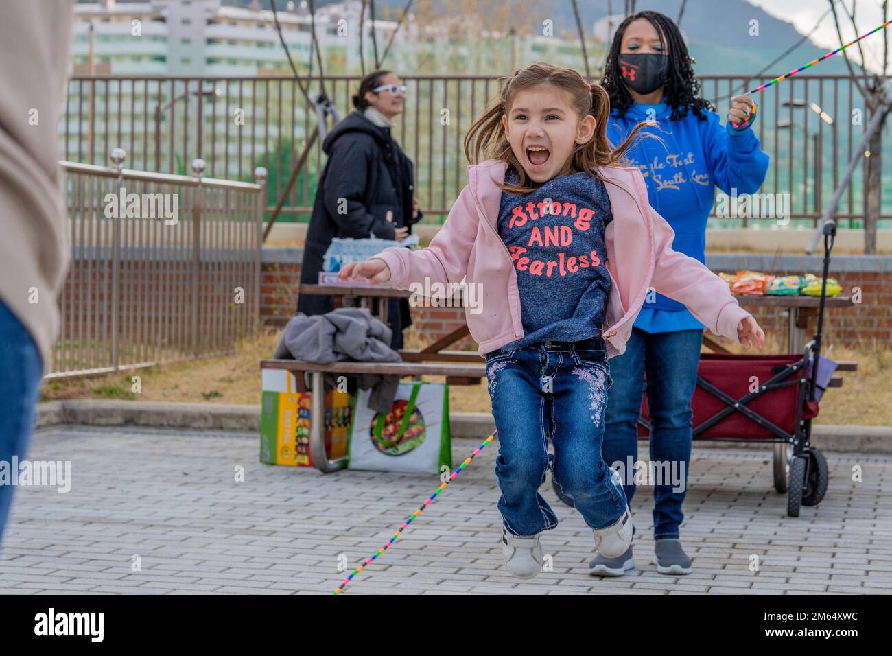 A young resident of U.S. Army Garrison Daegu's Army Family Housing ...