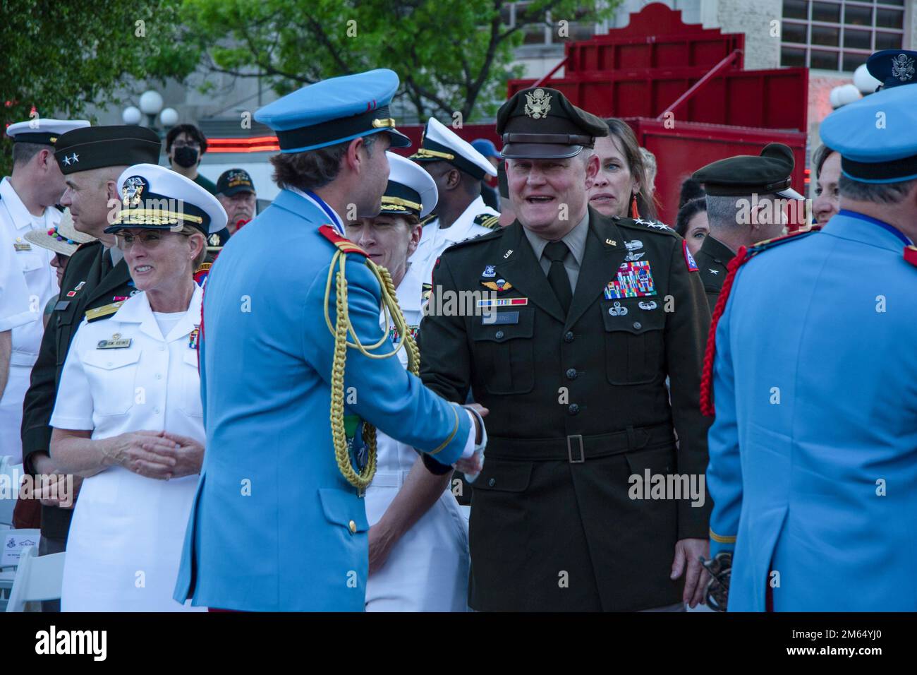 U.S. Army Lt. Gen. John R. Evans, commanding general of U.S. Army North, shakes hands with a ...