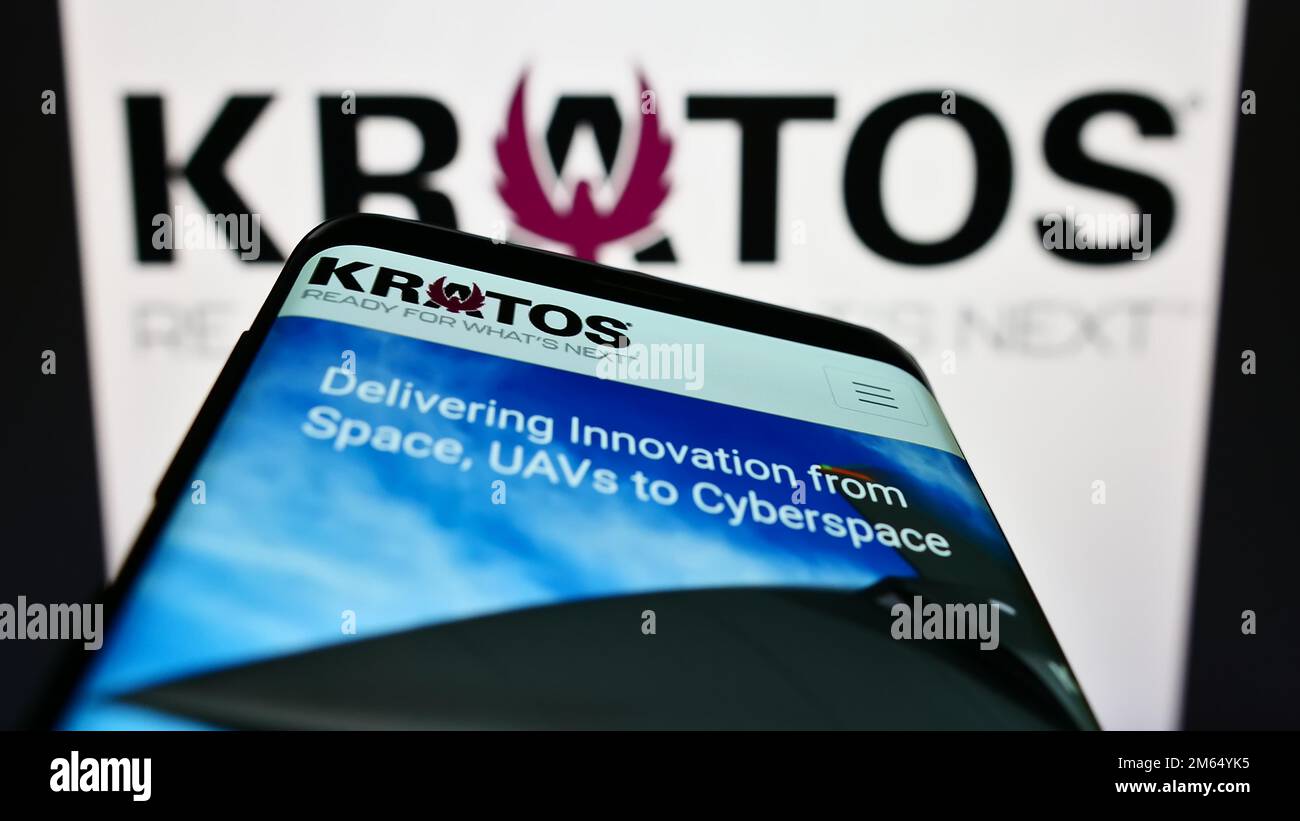 Mobile phone with webpage of company Kratos Defense Security Solutions ...