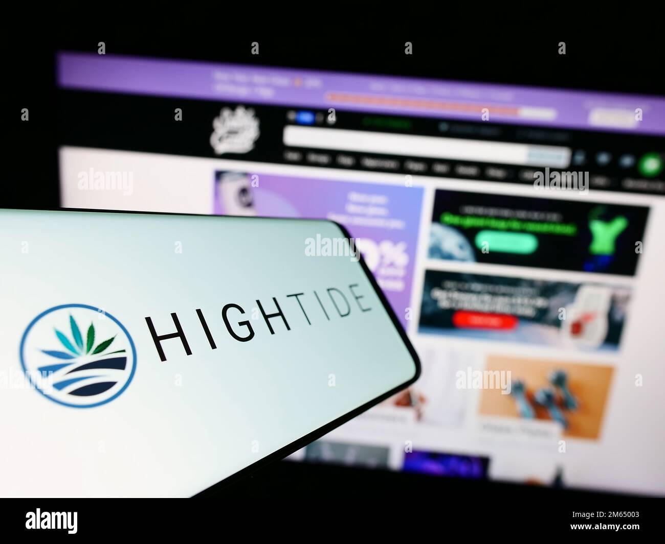 Smartphone with logo of Canadian cannabis company High Tide Inc. on ...