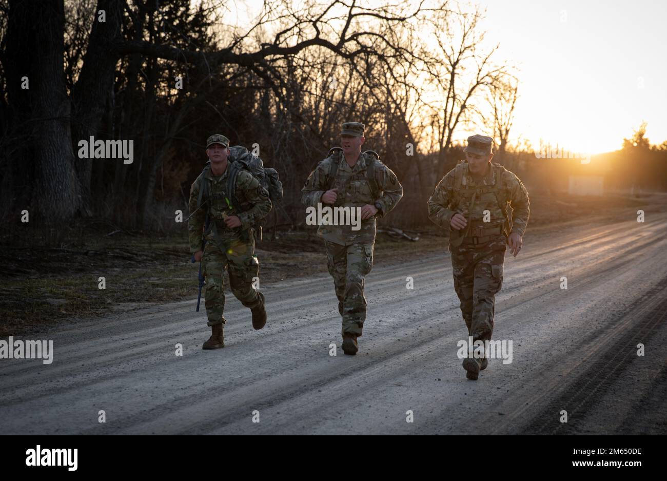 Iowa Army National Guard Soldiers conduct a 12-mile road march at ...