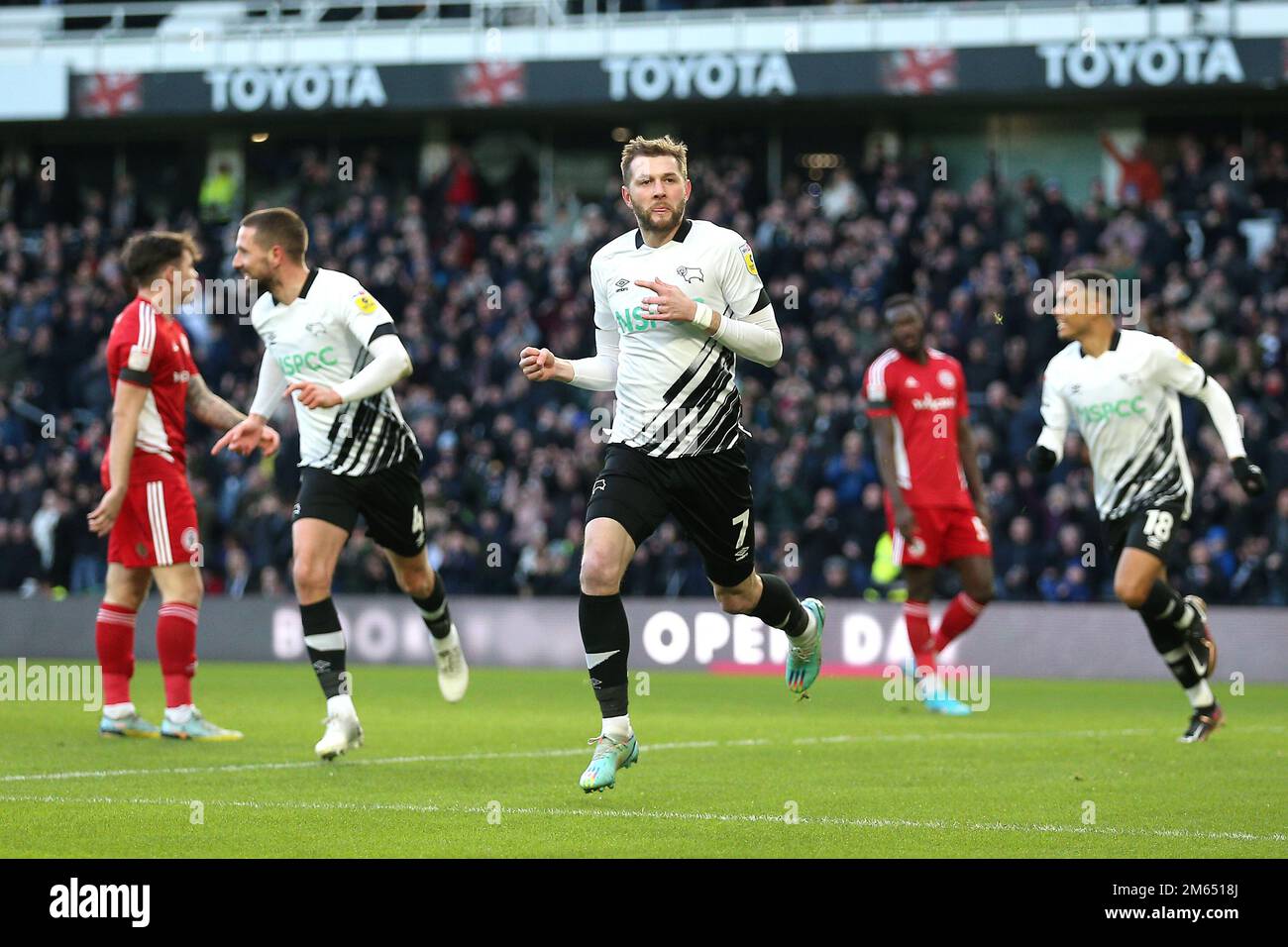 Derby County's Tom Barkhuizen (centre) celebrates scoring their side's ...