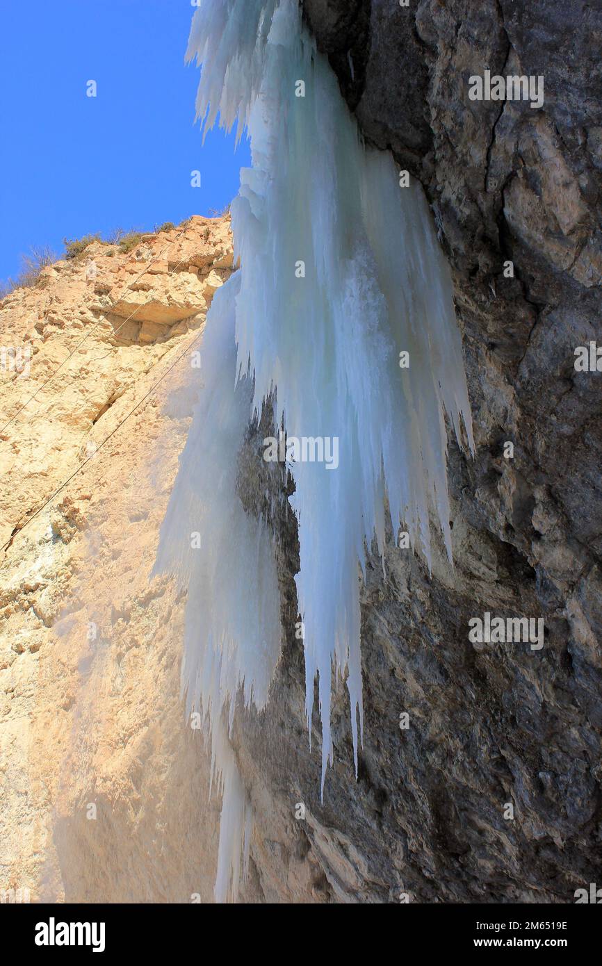 Icicles of a frozen waterfall. Afurja village, Guba region, Azerbaijan ...