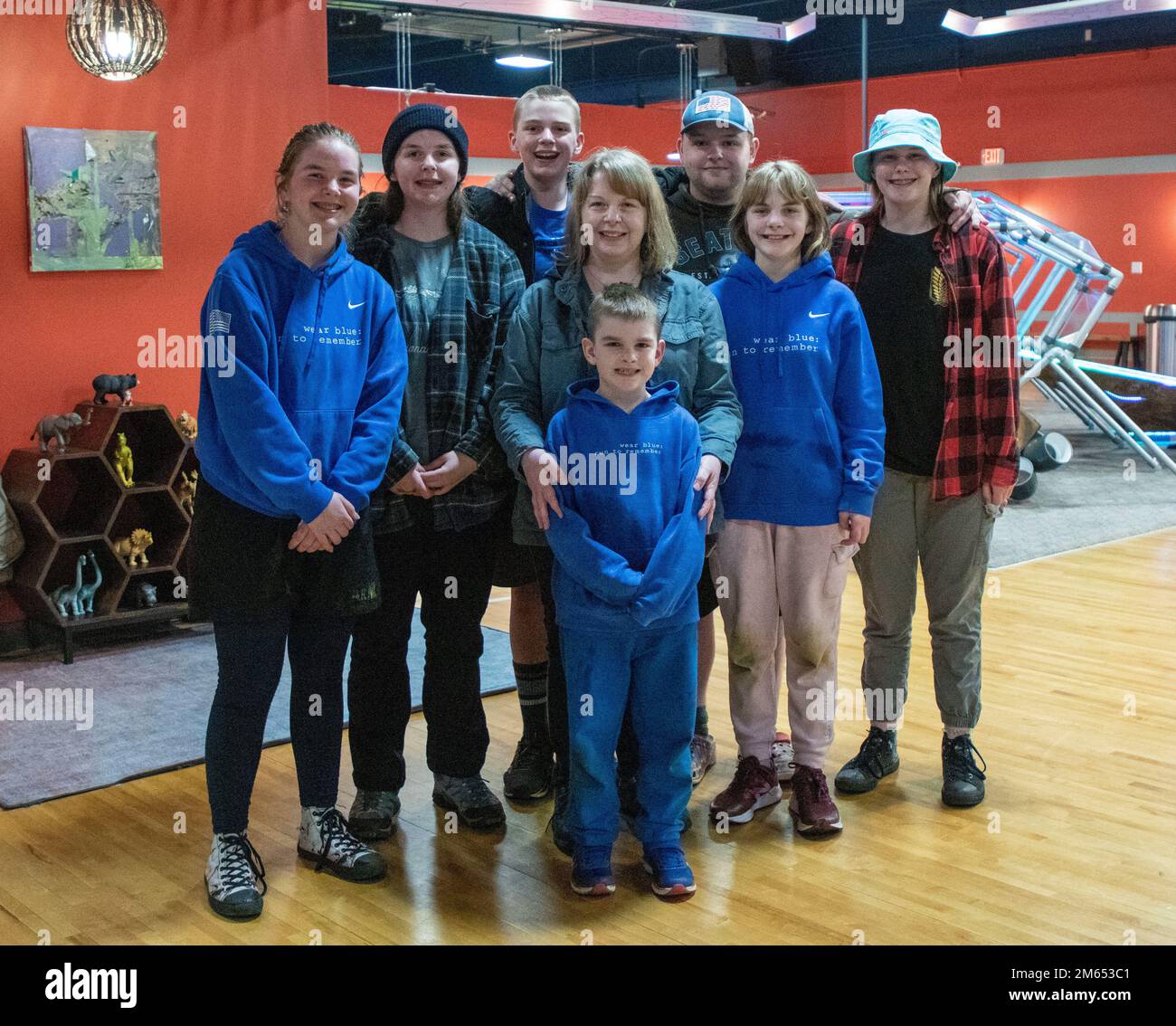 Jennifer Parmar and her family pose at the Joint Base Lewis-McChord ...