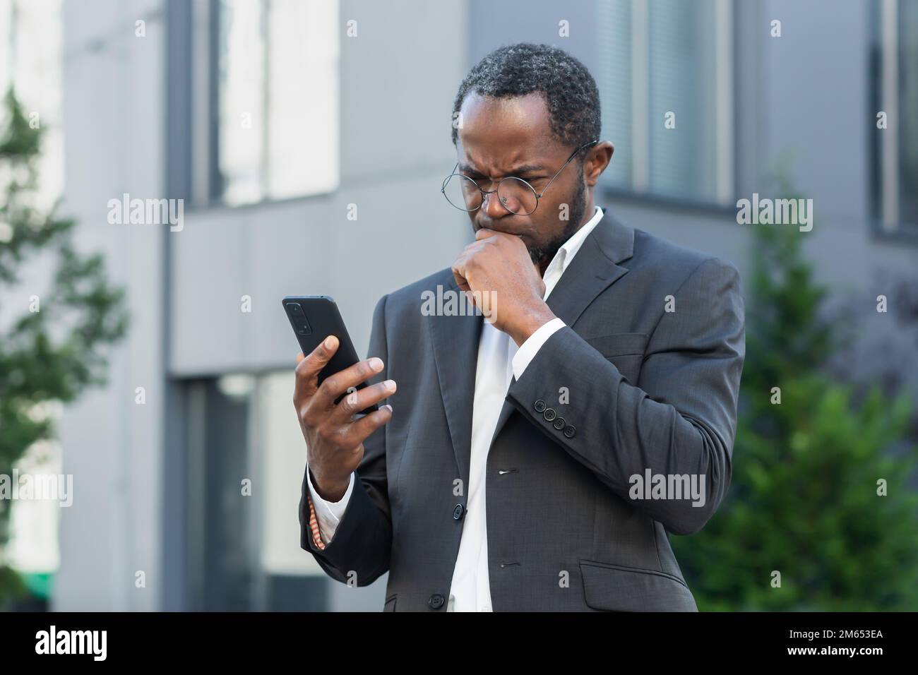 African businessman upset online loss hi-res stock photography and ...