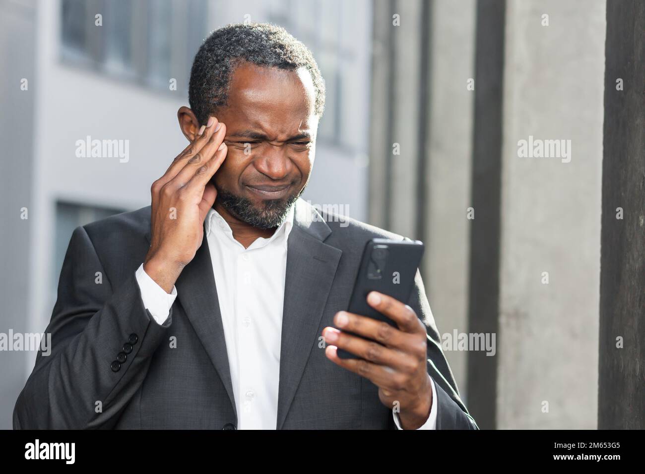 Businessman receiving phone call outside hi-res stock photography and ...