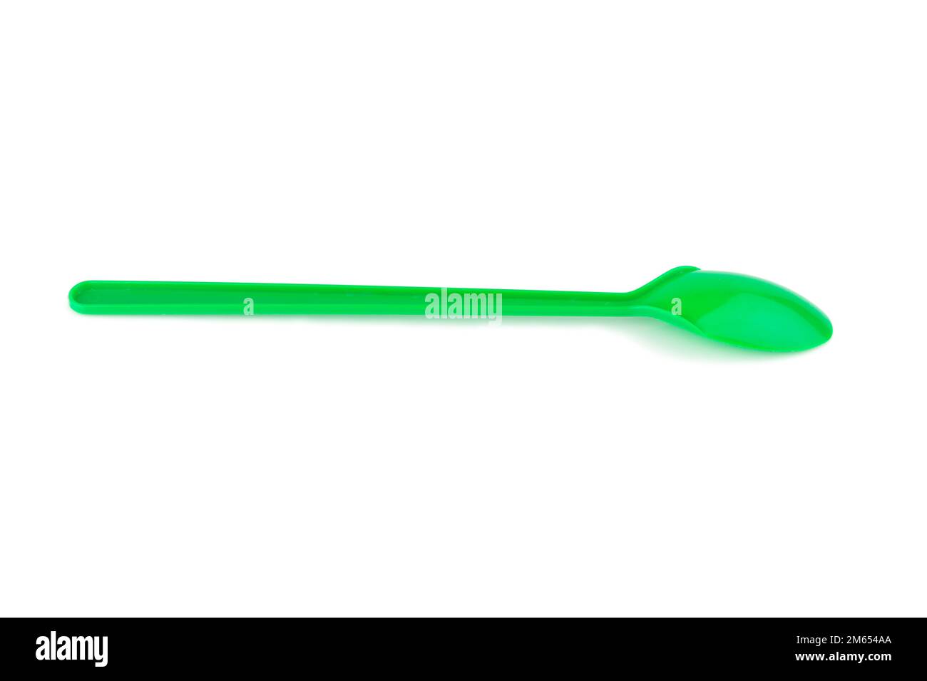 green spoon plastic isolated on white background Stock Photo - Alamy