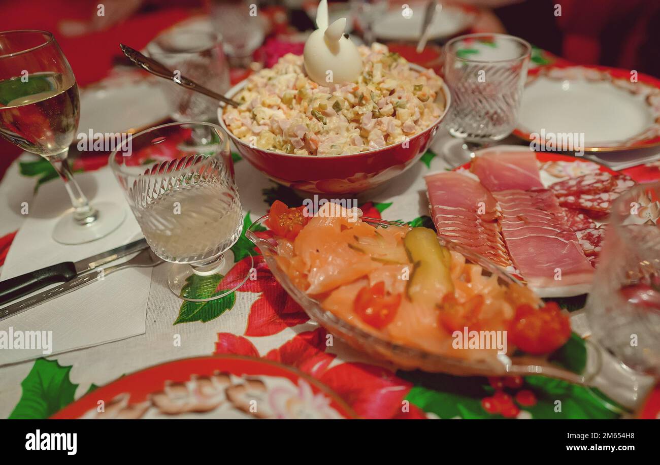 Traditional Russian New Year's table. Salads and cold cuts Stock Photo ...