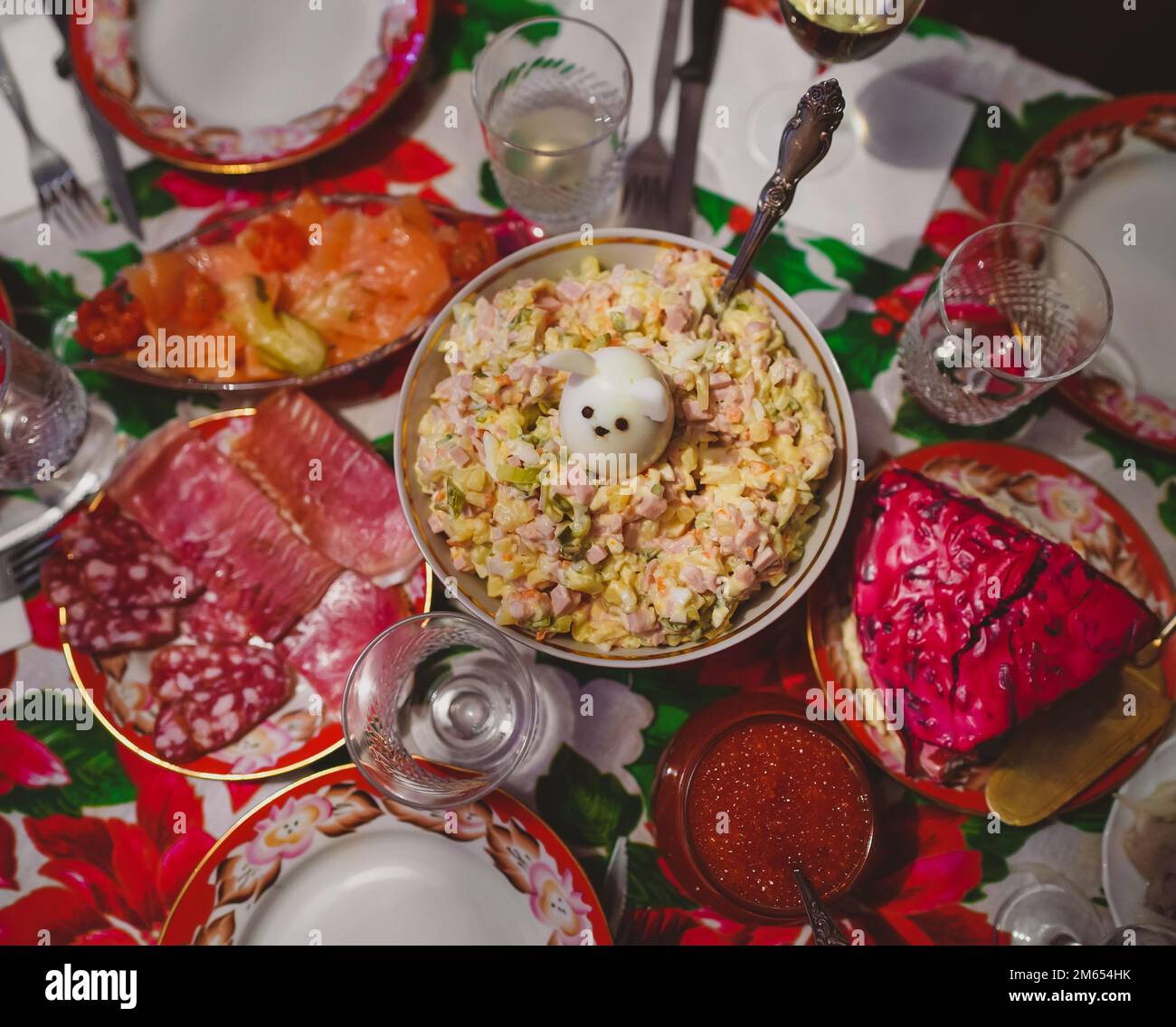 Traditional Russian New Year's table. Salads and cold cuts Stock Photo ...