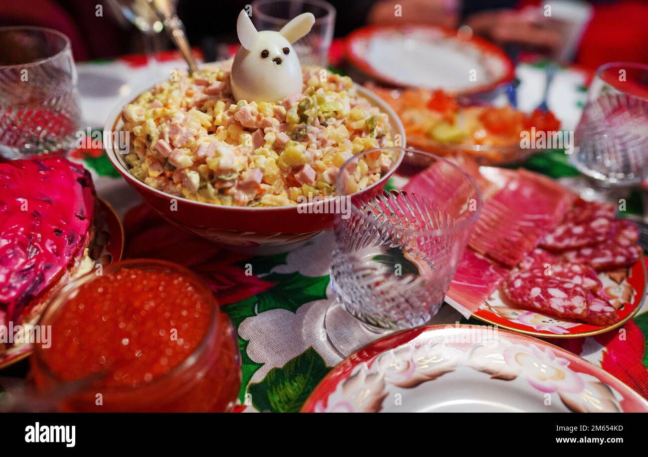 Traditional Russian New Year's table. Salads and cold cuts Stock Photo ...