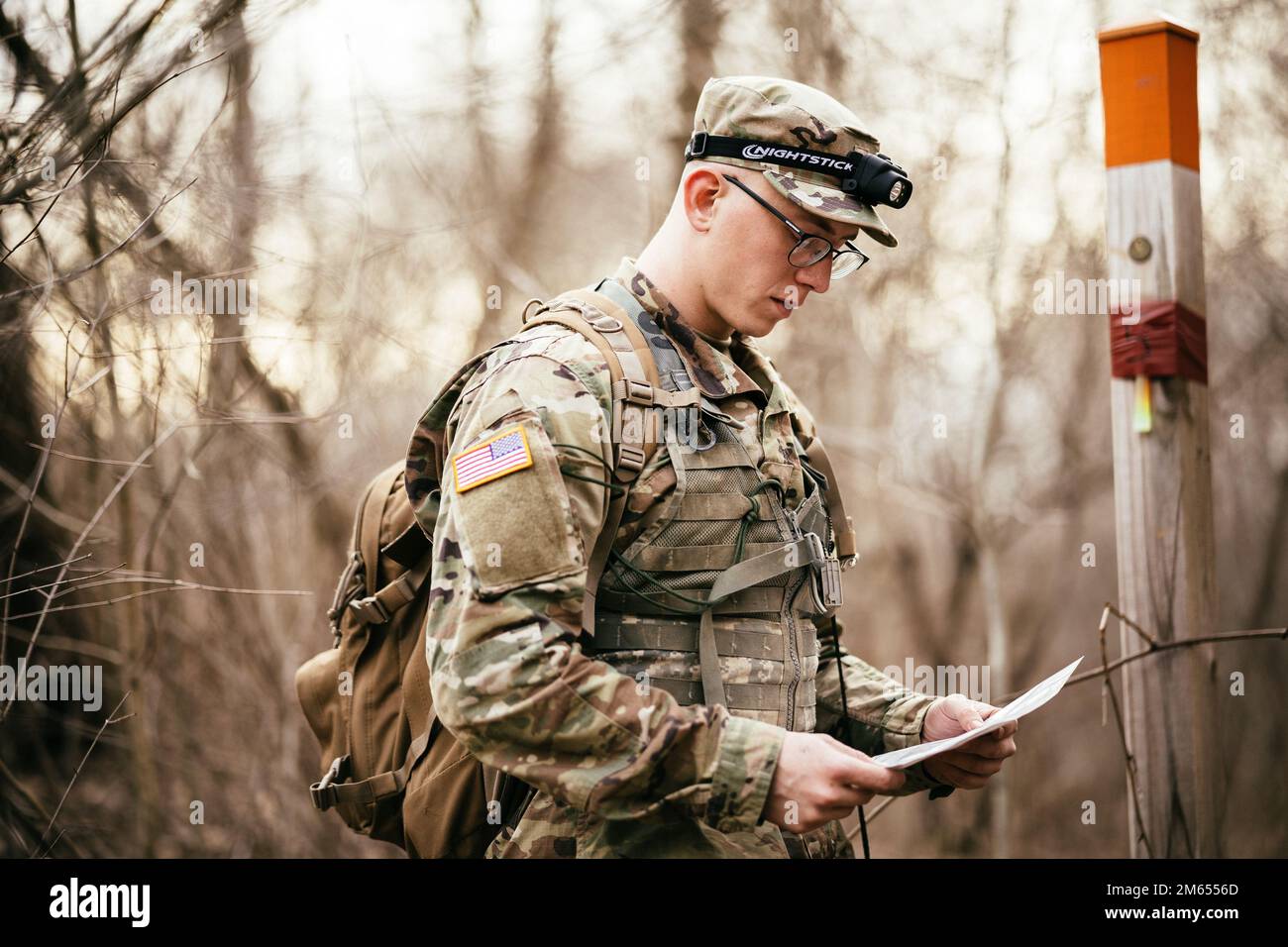 Spc. Brock Cerneka, 73rd Troop Command, prepares to move to his next ...