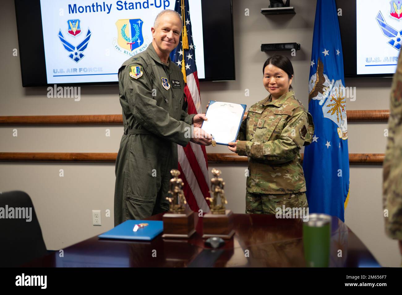 U.S. Air Force Master Sgt. Hong Zhou, a budget analyst with the 129th ...