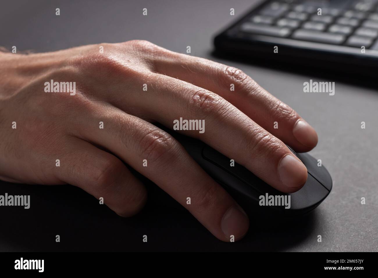 Hand using computer mouse, clicking pointer pc peripheral, close up ...