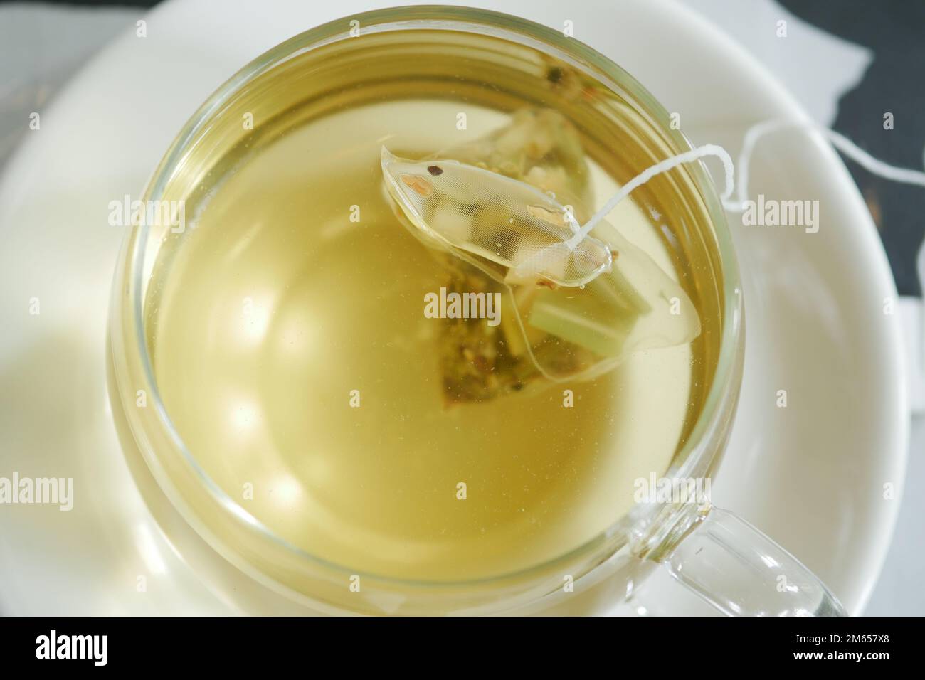 green tea and tea bag on table, close up Stock Photo - Alamy