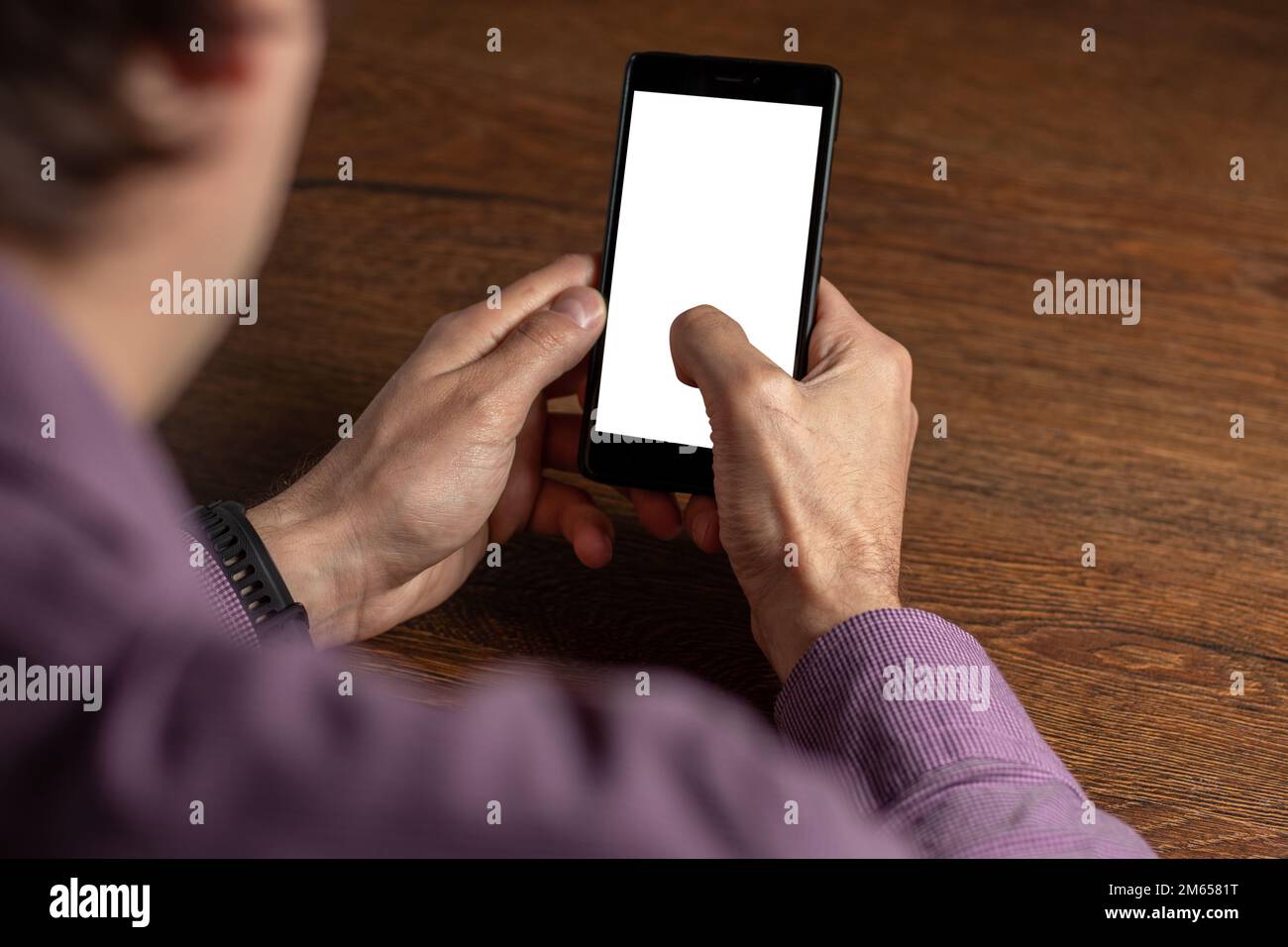 Man using smartphone at street night. Blank screen mobile phone for ...