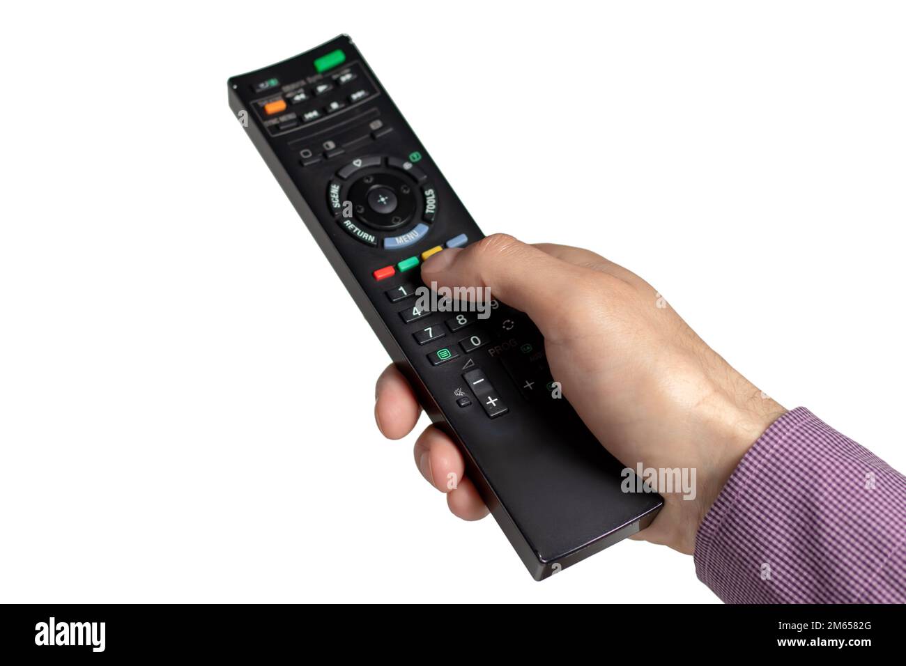 Hand holding television and audio remote control isolate on white ...