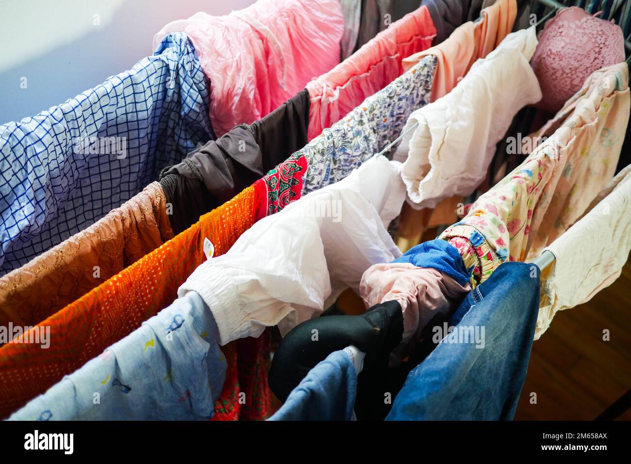 House filled with clothes hi-res stock photography and images - Alamy