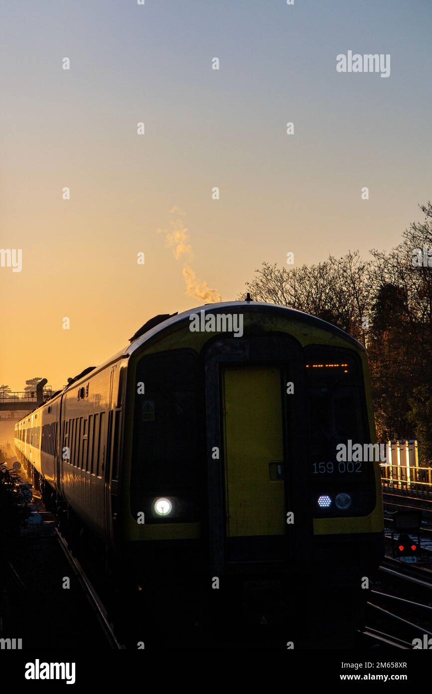 A South Western train approaches Woking station during a period of ...