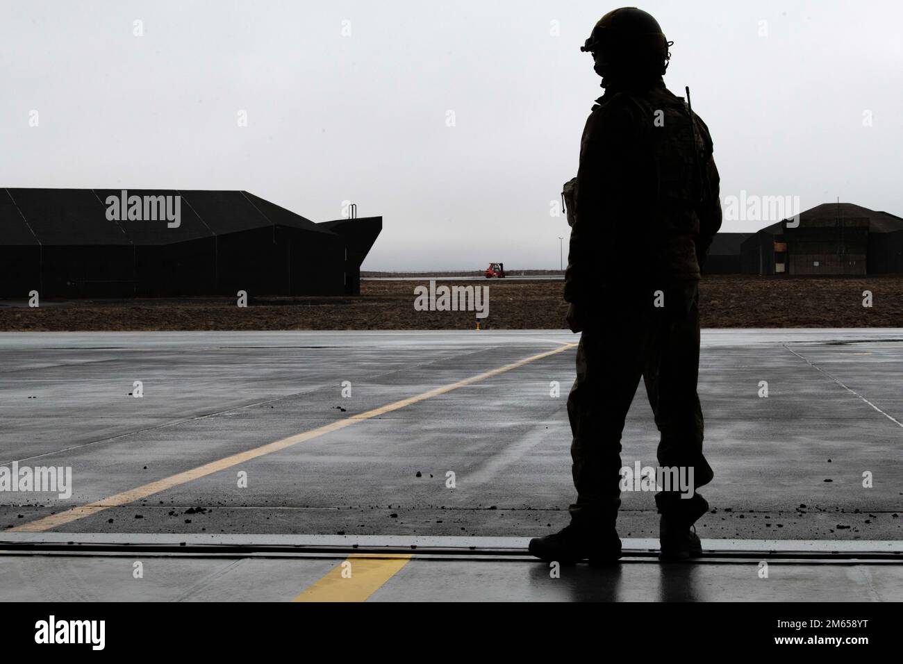 220403-N-RB149-1014 KEFLAVIK AIR BASE, Iceland (April 3, 2022) A member ...