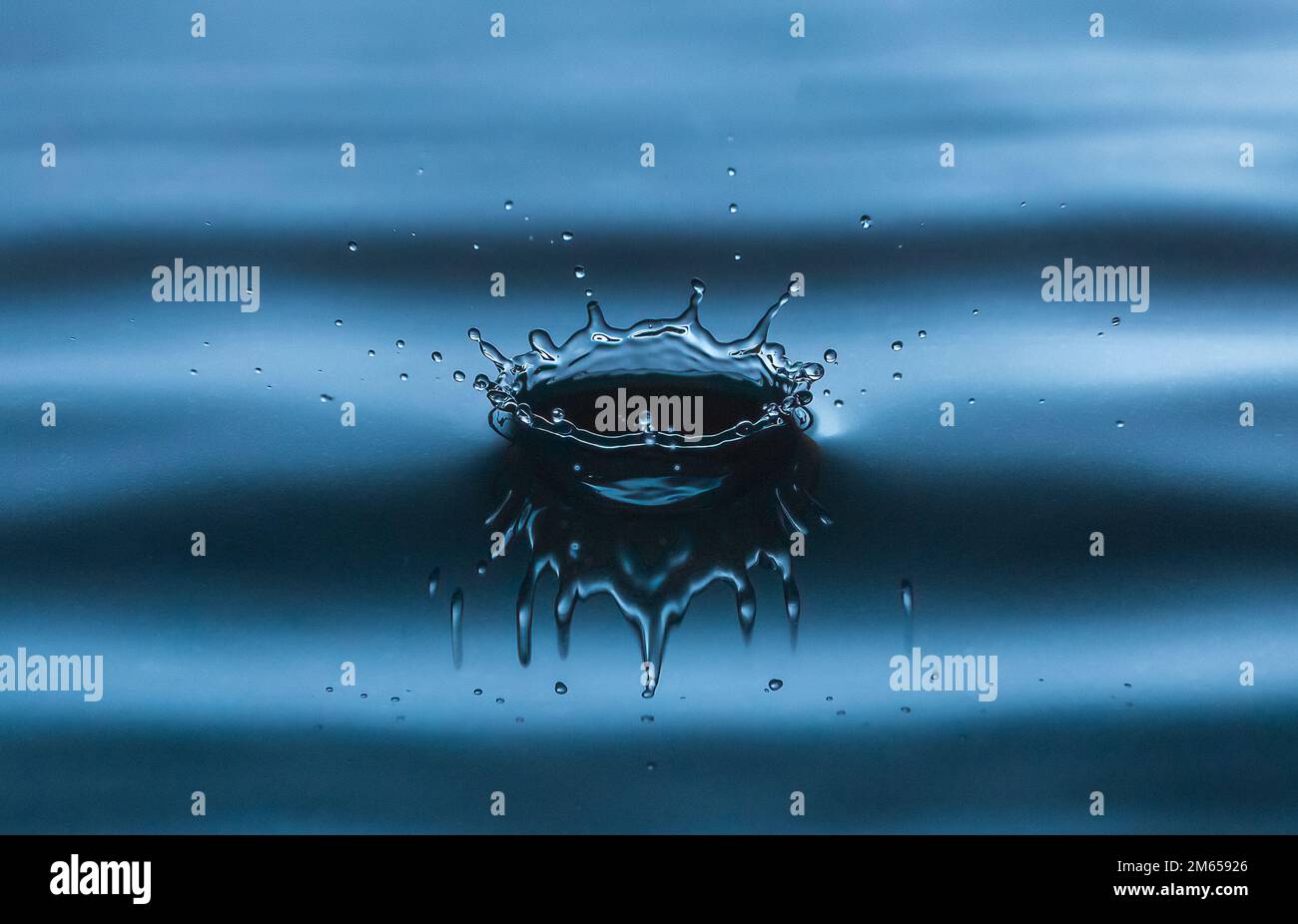 Beautiful splash of water drop. Freeze action. High-speed shooting of ...