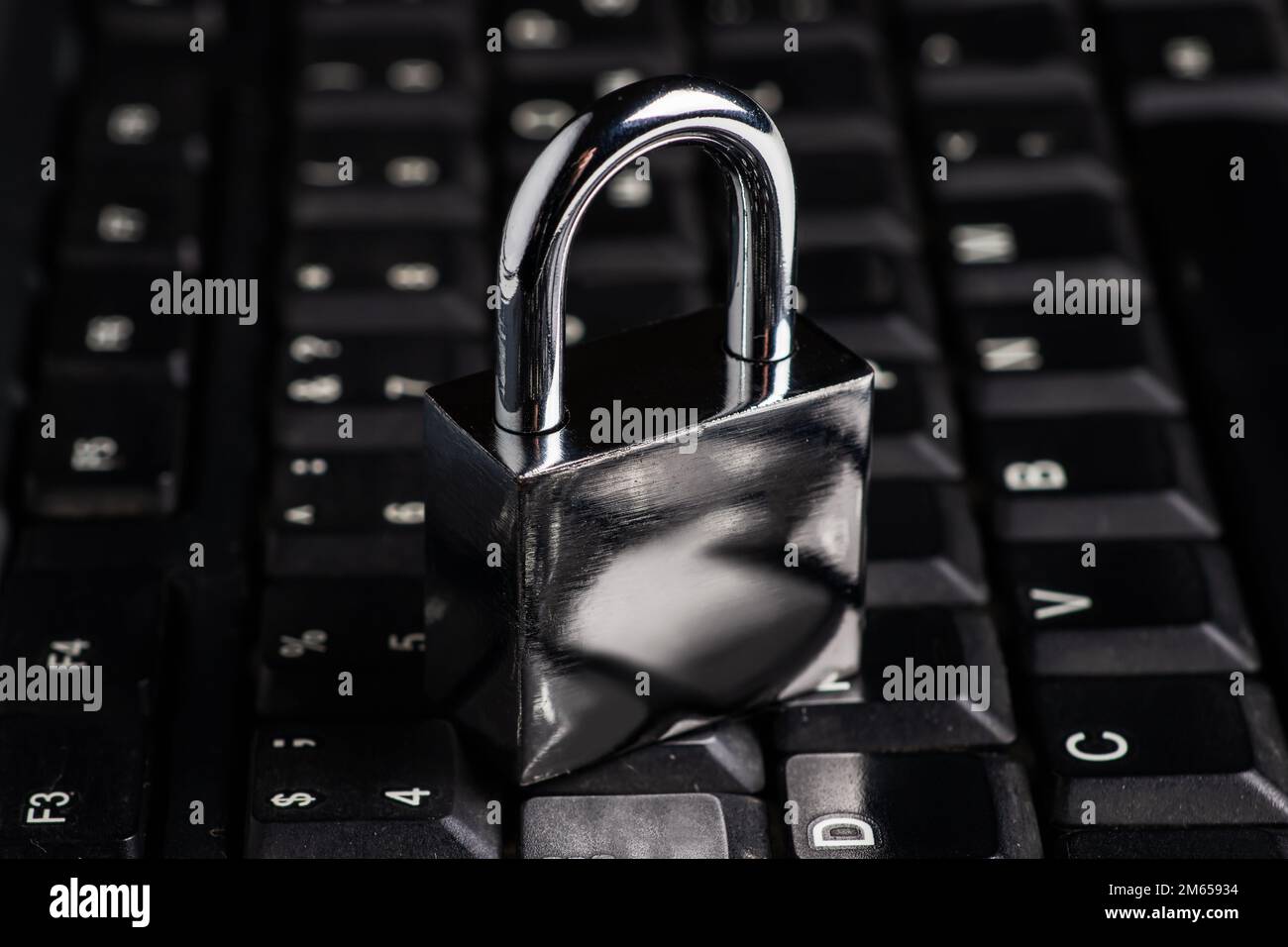 Computer security concept with a closed padlock on the keyboard Stock Photo - Alamy