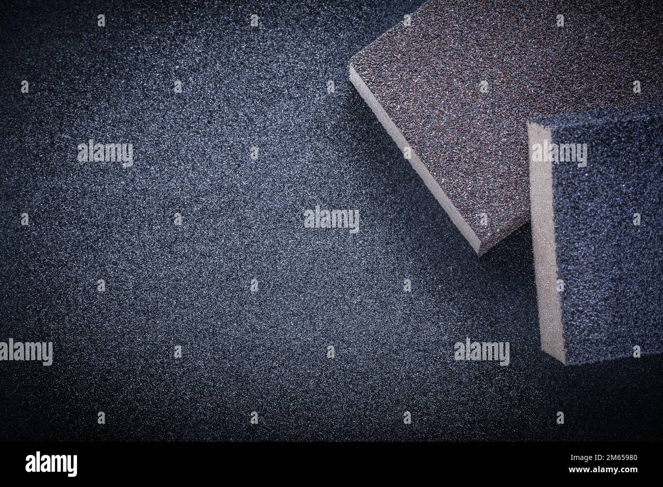 Abrasive sponges on emery paper Stock Photo - Alamy