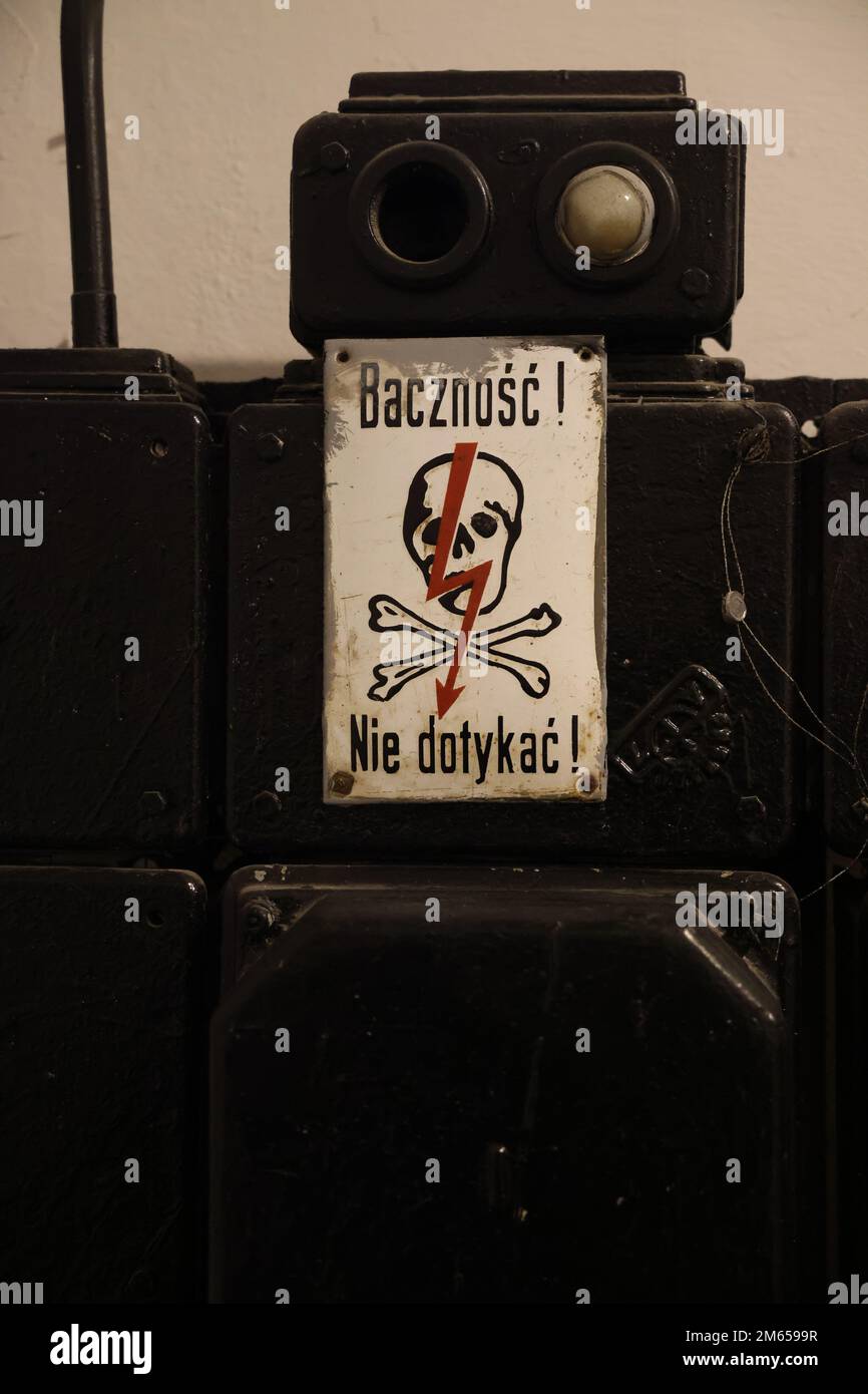 Old apparatus from the Cold War time with warning sign in Polish ...