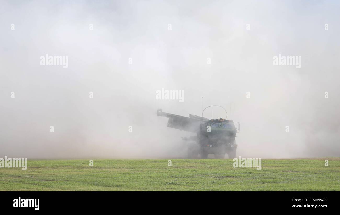 U.S. Marines with 10th Marine Regiment, 2d Marine Division, fire a ...